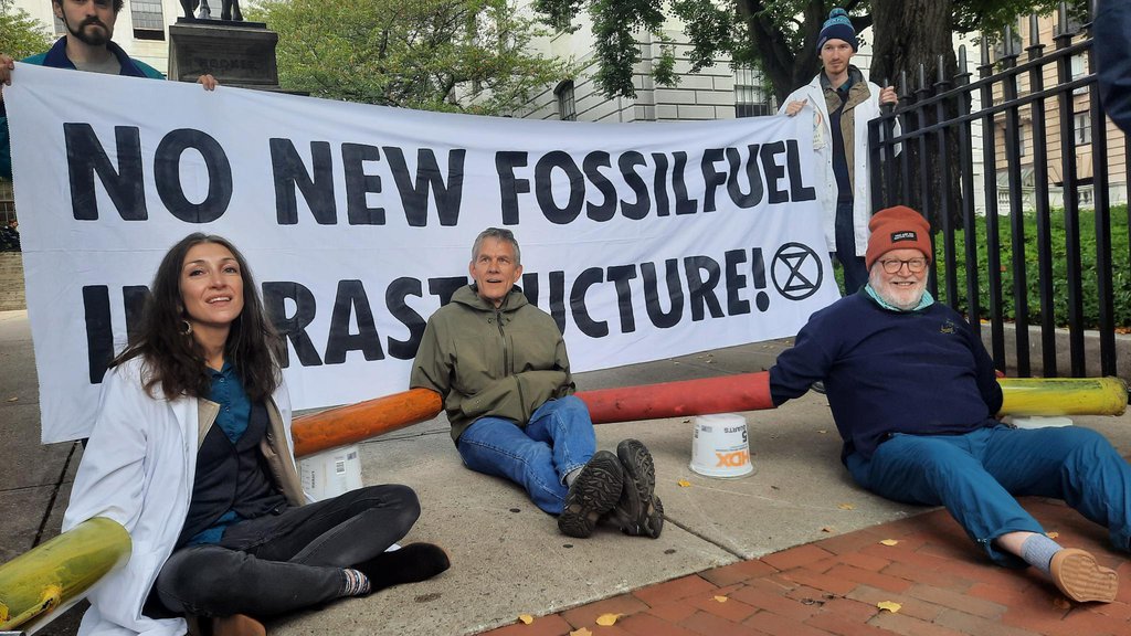 Extinction Rebellion Boston :: XR Boston RETURNS to Lock Themselves to ...